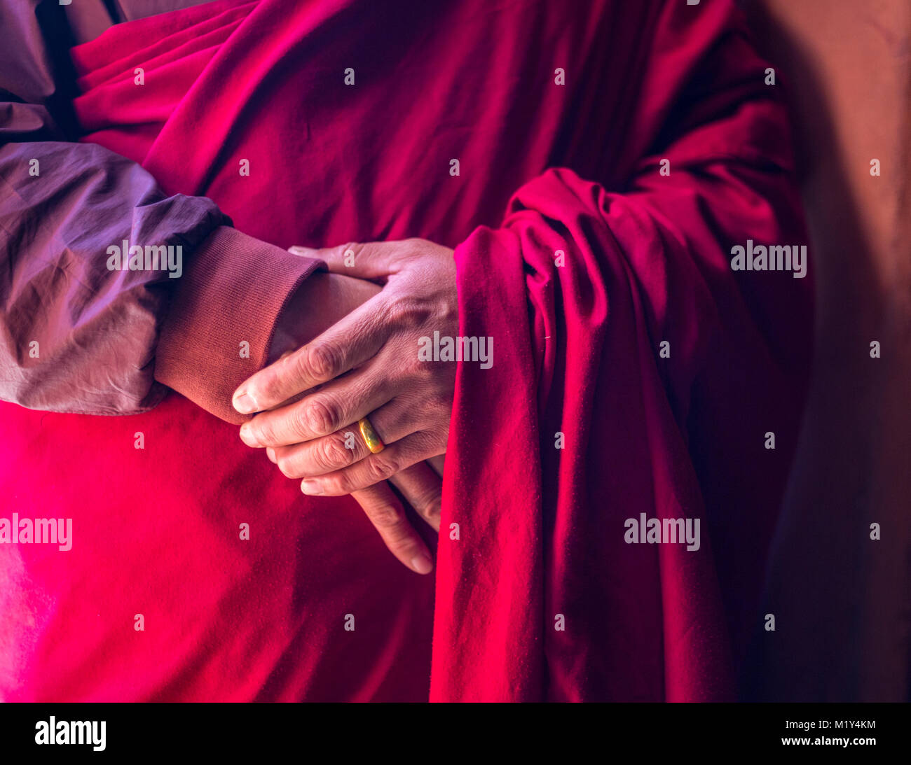Paro, Bhutan. Buddhist Monk's Hands, Ring, and Robe Stock Photo - Alamy