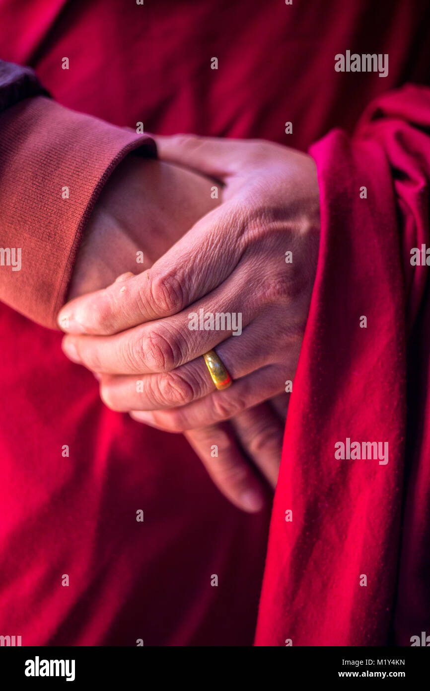 Paro, Bhutan. Buddhist Monk's Hands, Ring, and Robe Stock Photo - Alamy