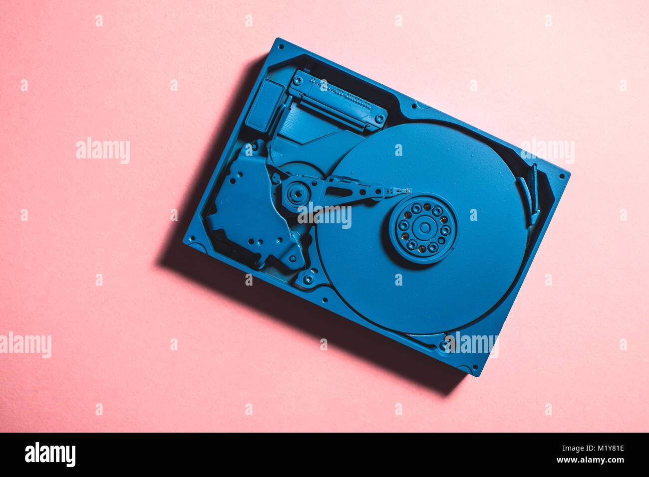 Unicolour hards disc pink colour background Stock Photo - Alamy