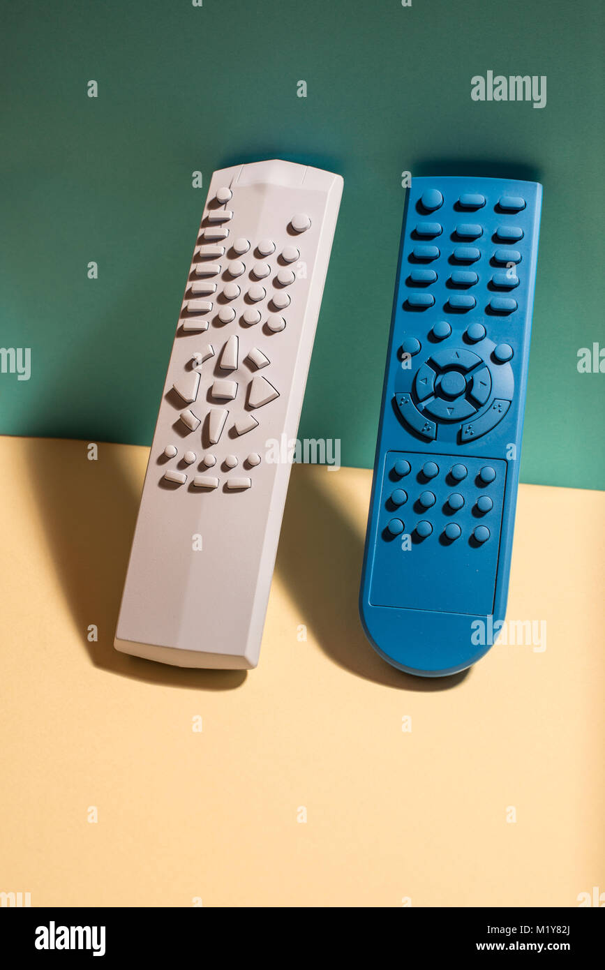 Remote controls on yellow hi-res stock photography and images - Alamy