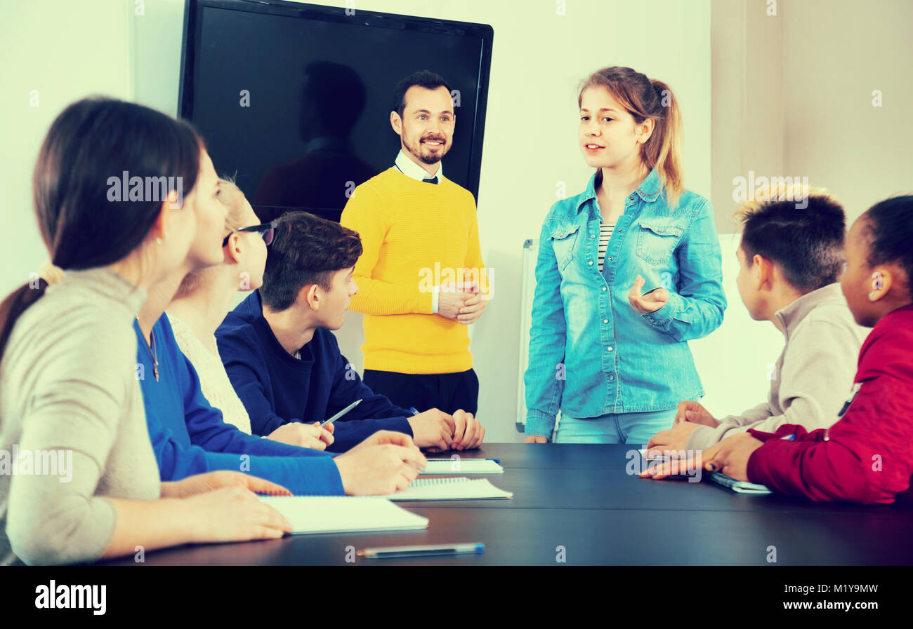 Female teacher board serious hi-res stock photography and images - Alamy