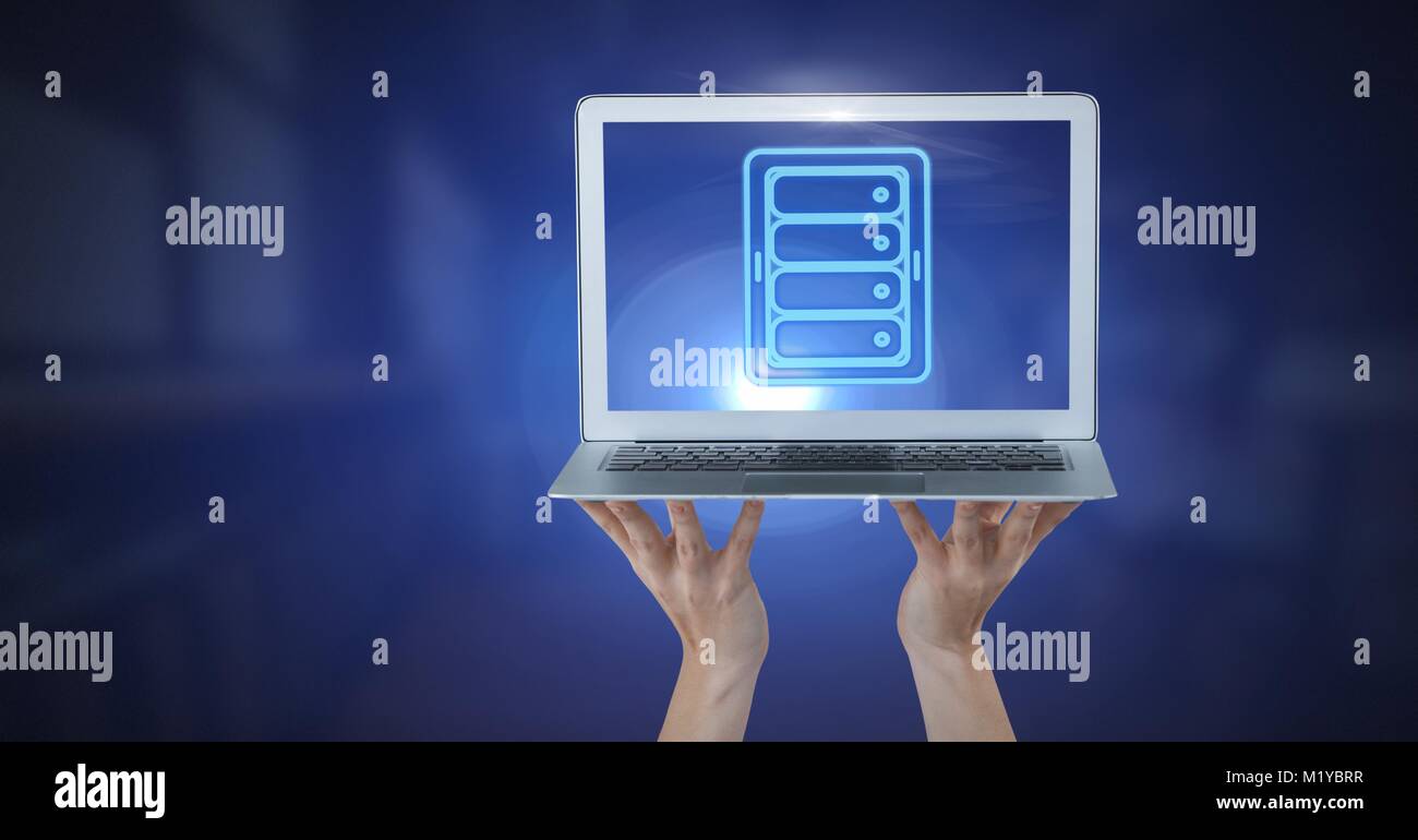 Hand holding laptop with server icon Stock Photo - Alamy