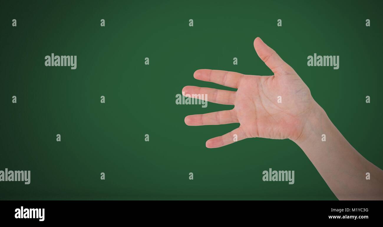 Hand open with fingers on green background Stock Photo - Alamy