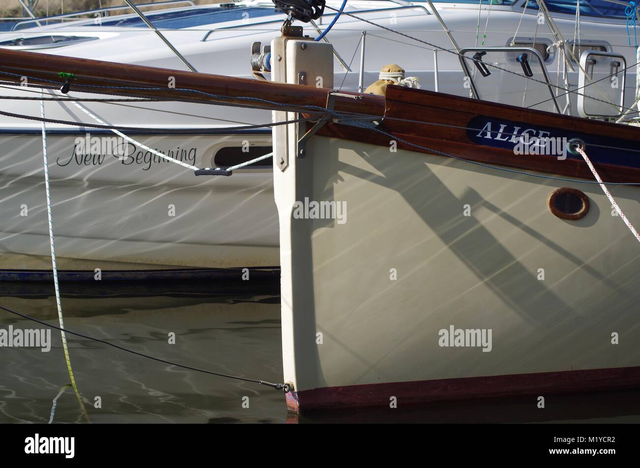 Bow and Bowsprit Mast of Traditional Yacht and Bow of Modern Speedboat ...