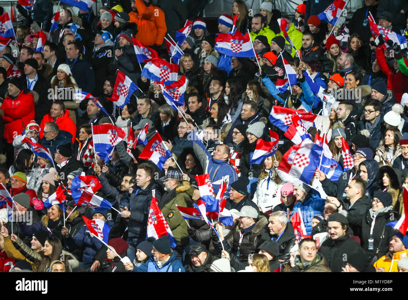 ZAGREB, CROATIA - JANUARY 4, 2018 : Croatian fans with flags during the ...