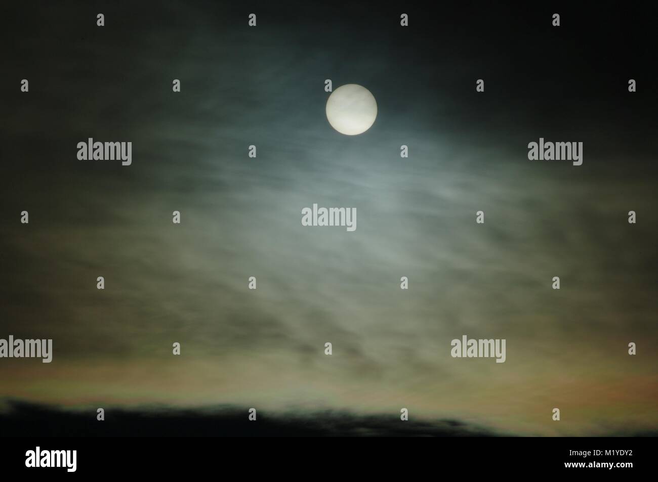 Weak Sun Shines through Maceral Altocumulus Clouds in a Spooky Abstract ...