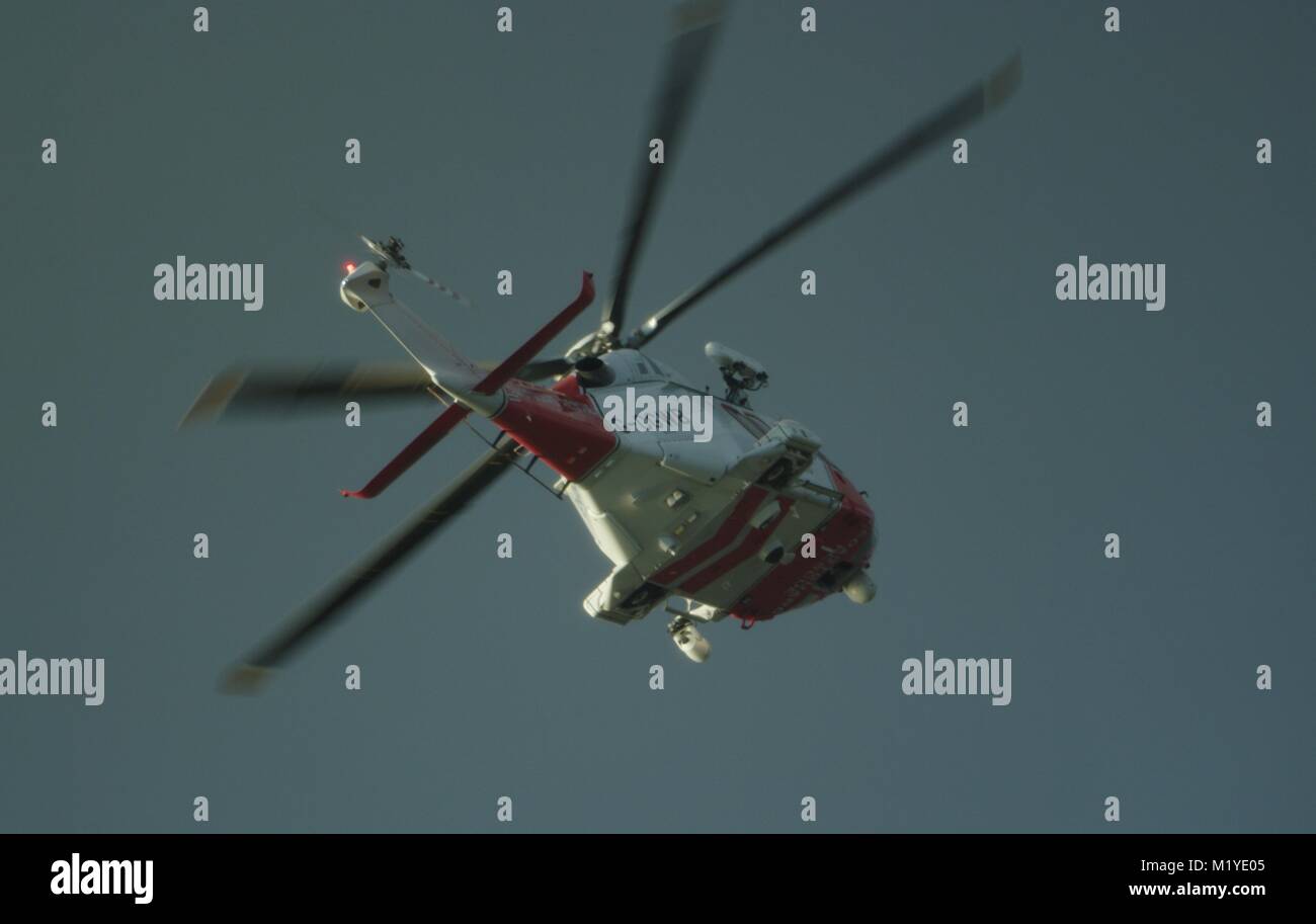 Royal Navy Helicopter Flying over the English Channel. Dawlish, South ...
