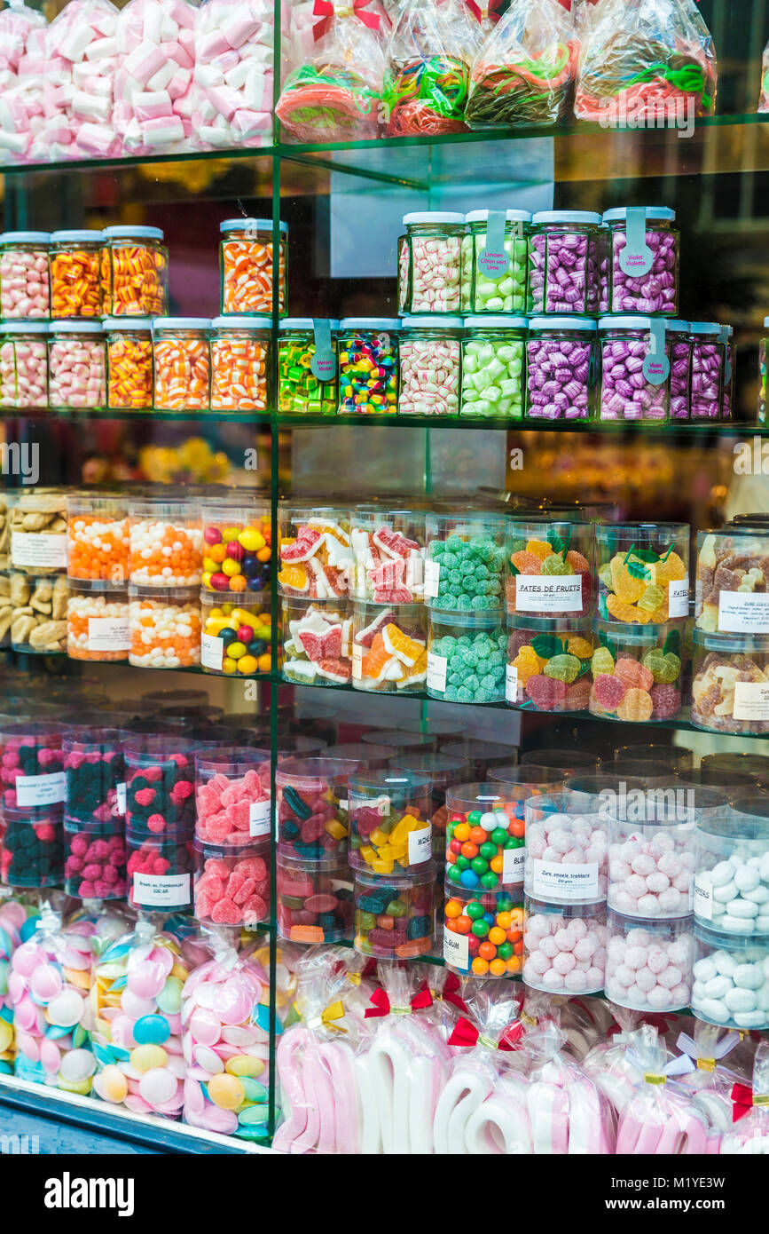 Bruges, Belgium - September 1, 2017: Display of a candy shop full of ...