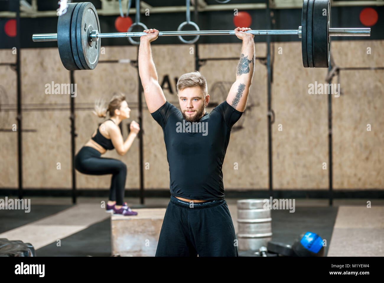 Man lifting woman up hi-res stock photography and images - Alamy