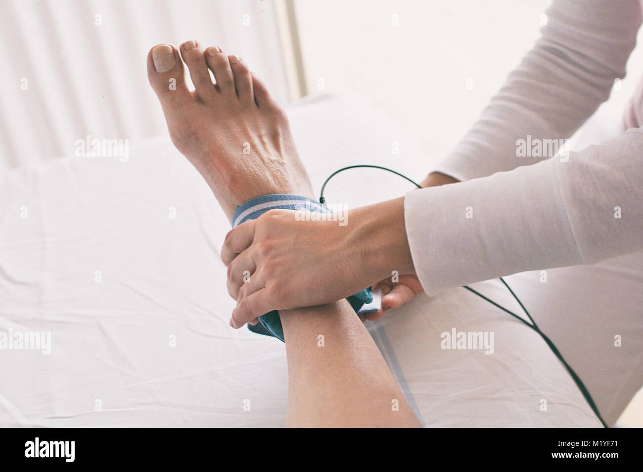 Professional doctor patient in bedroom hi-res stock photography and ...