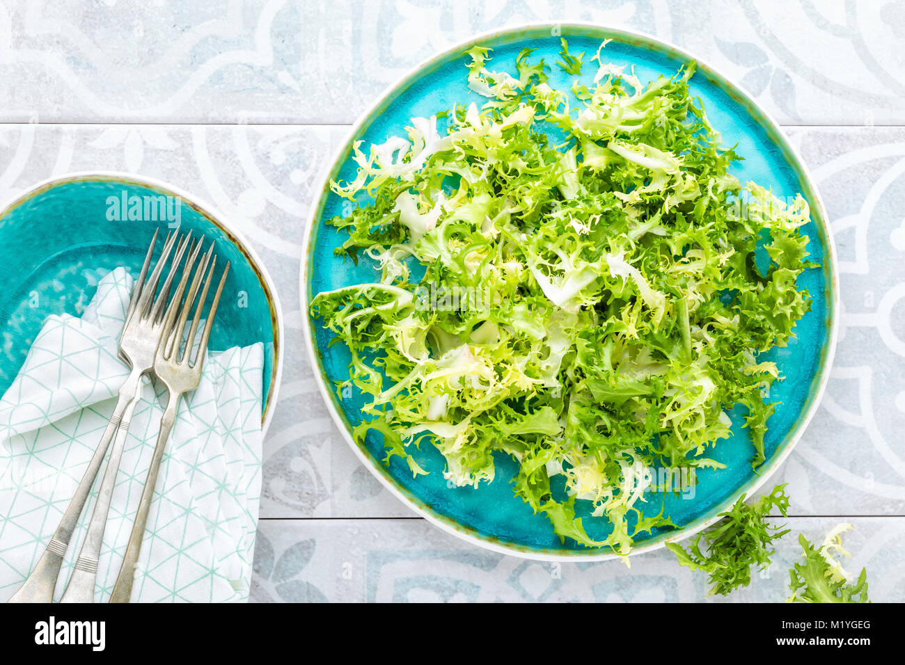 Frize lettuce salad, fresh frisee. Healthy vegetarian food Stock Photo ...