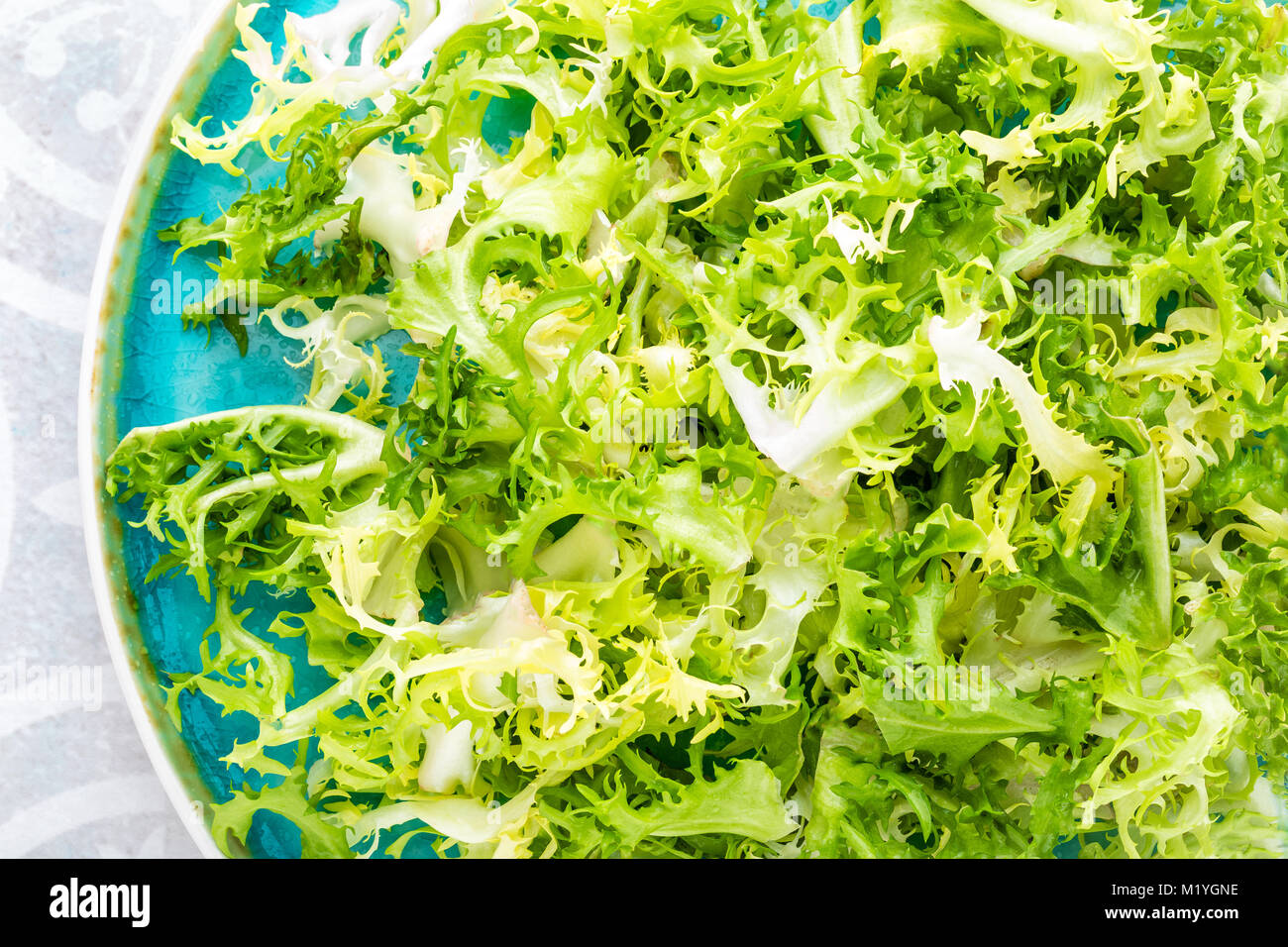 Frize lettuce salad, fresh frisee. Healthy vegetarian food Stock Photo ...