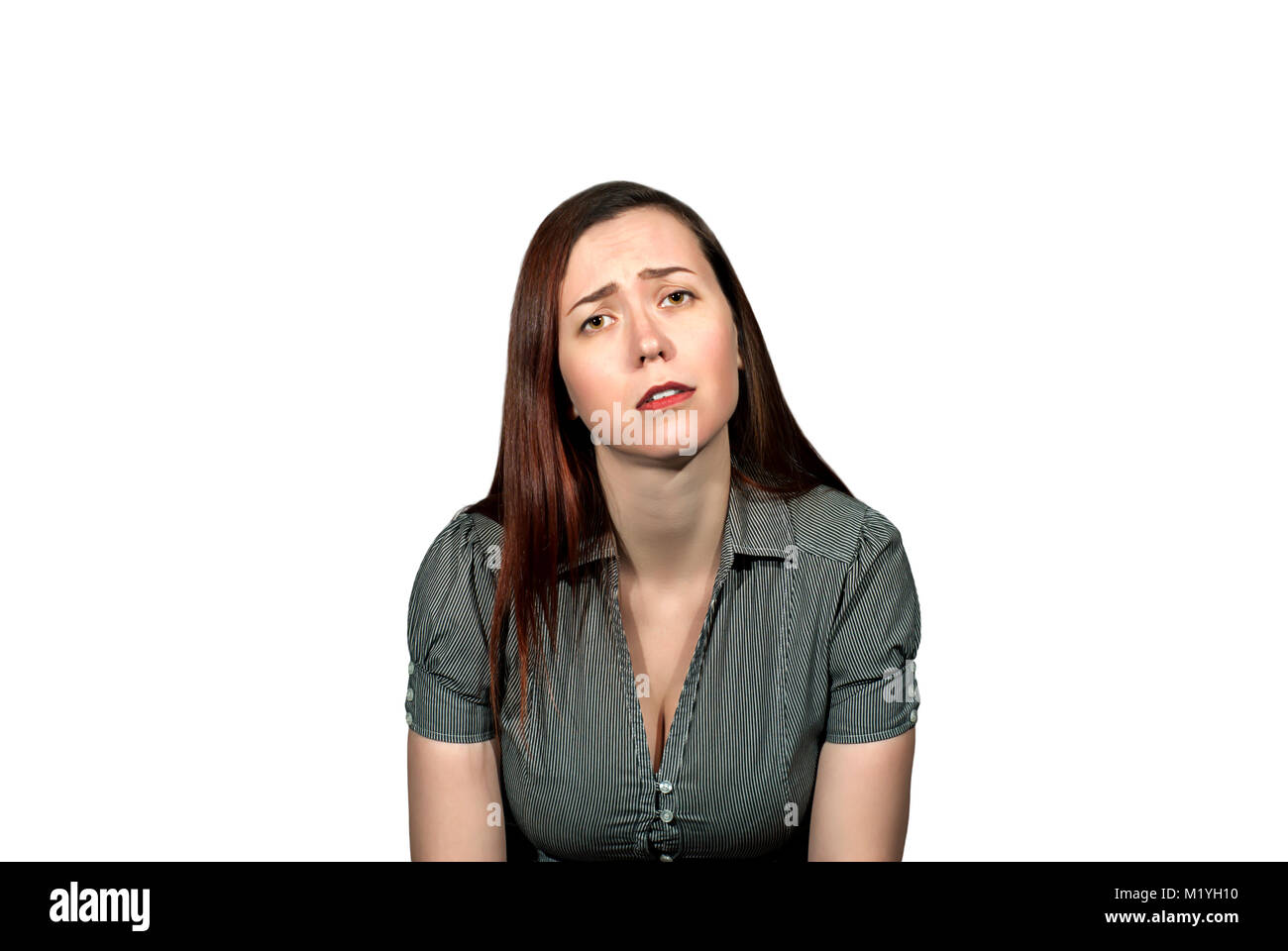 girl on a white background with an expression of frustration or fatigue ...
