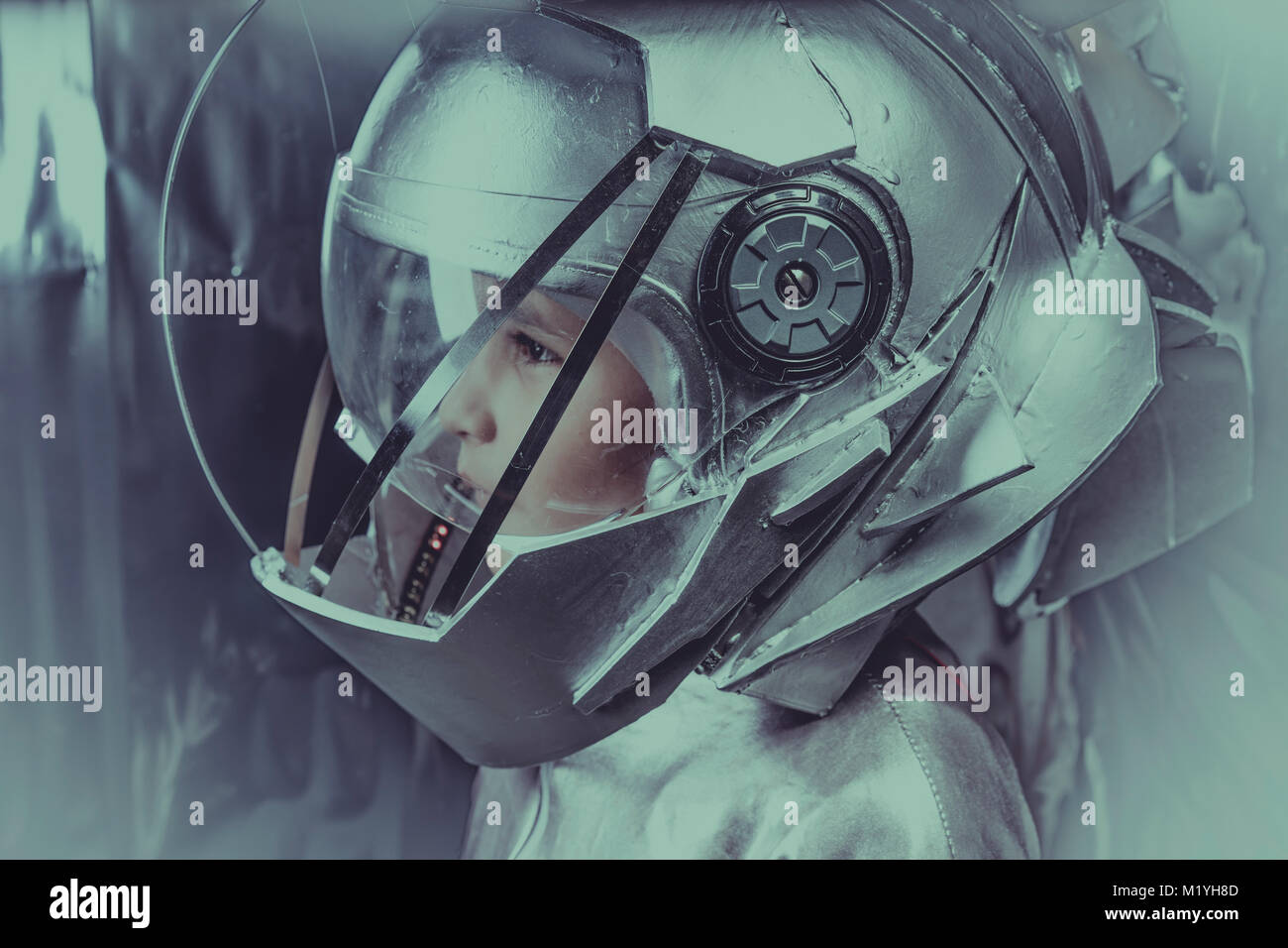 Cosmonaut, Boy playing to be an astronaut with space helmet and metal ...