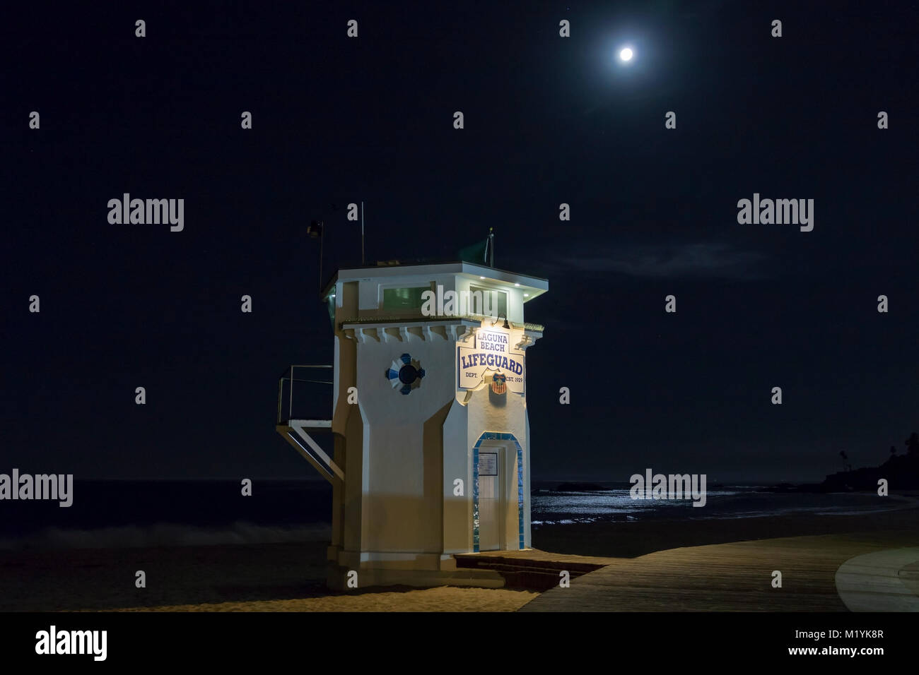 Beach lifeguard tower at night at Laguna Beach, California Stock Photo ...