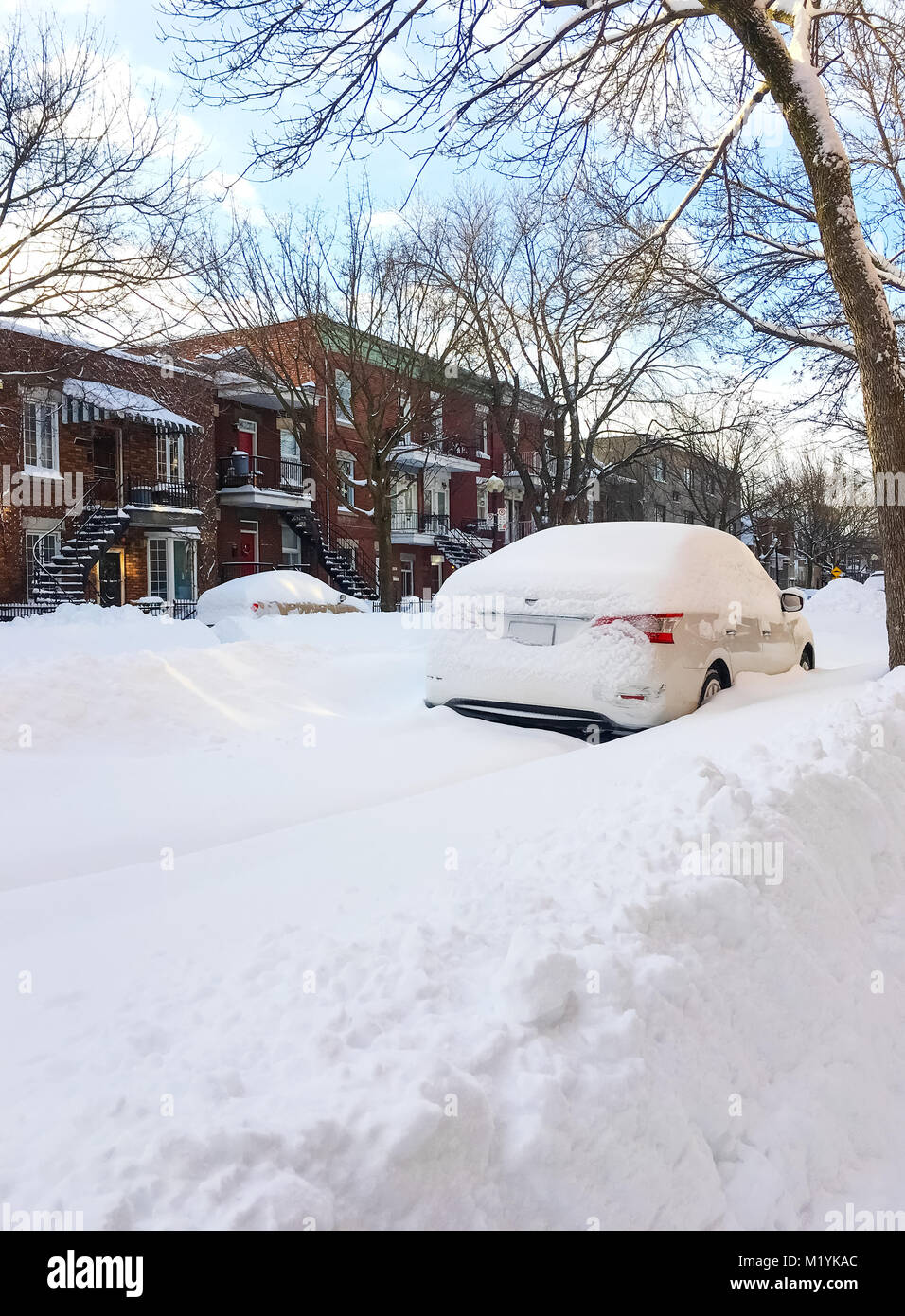 Urban winter street with lots of snow. Montreal, Quebec, Canada Stock ...