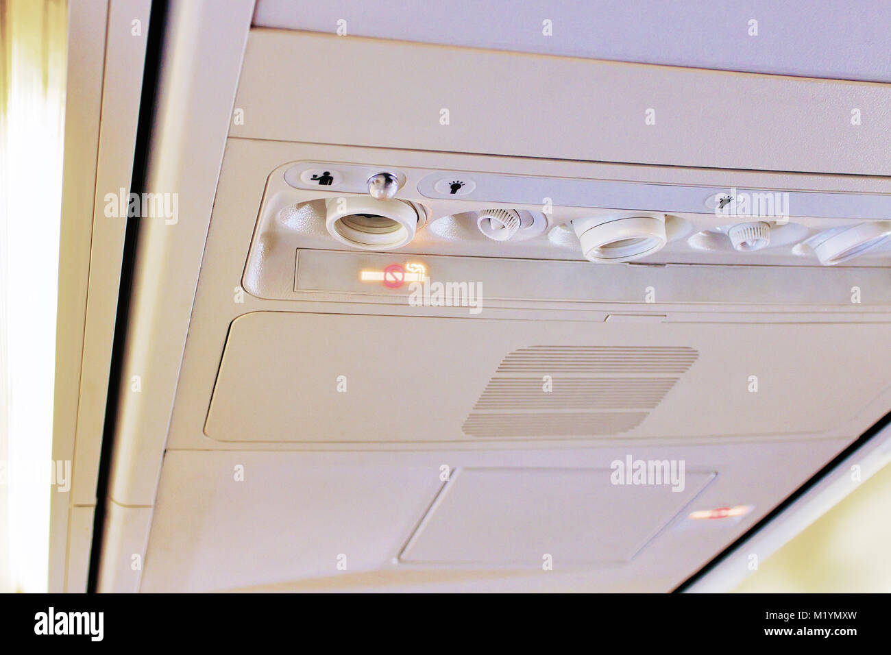 Overhead console of the airplane Stock Photo - Alamy