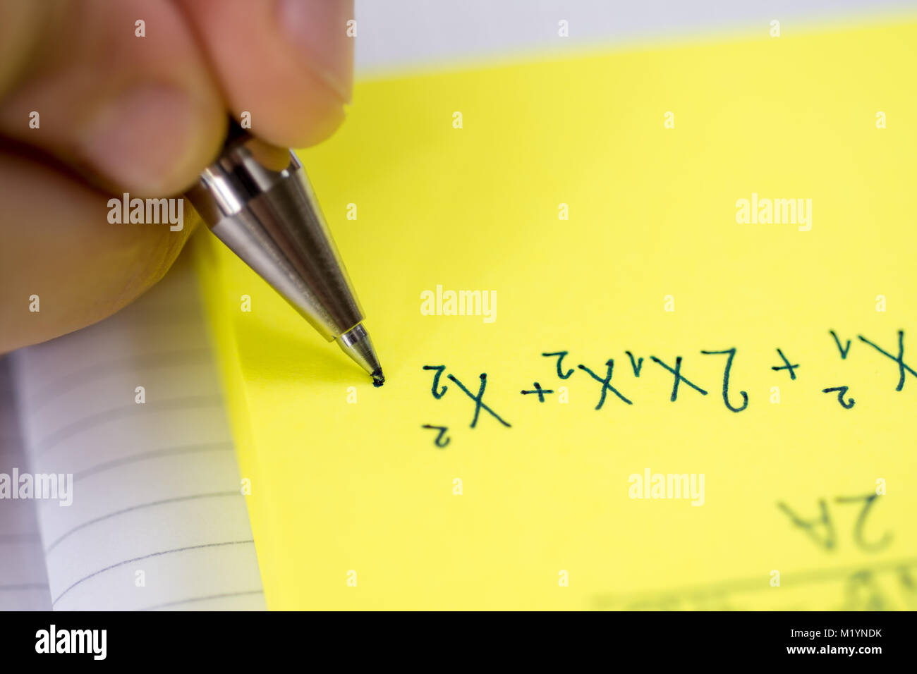 Writing on Yellow Sticky Notes Close Up. Pencil in Children Hand Stock ...