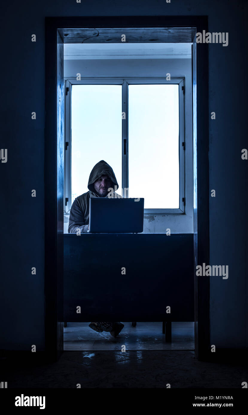Hackers hooded hi-res stock photography and images - Alamy