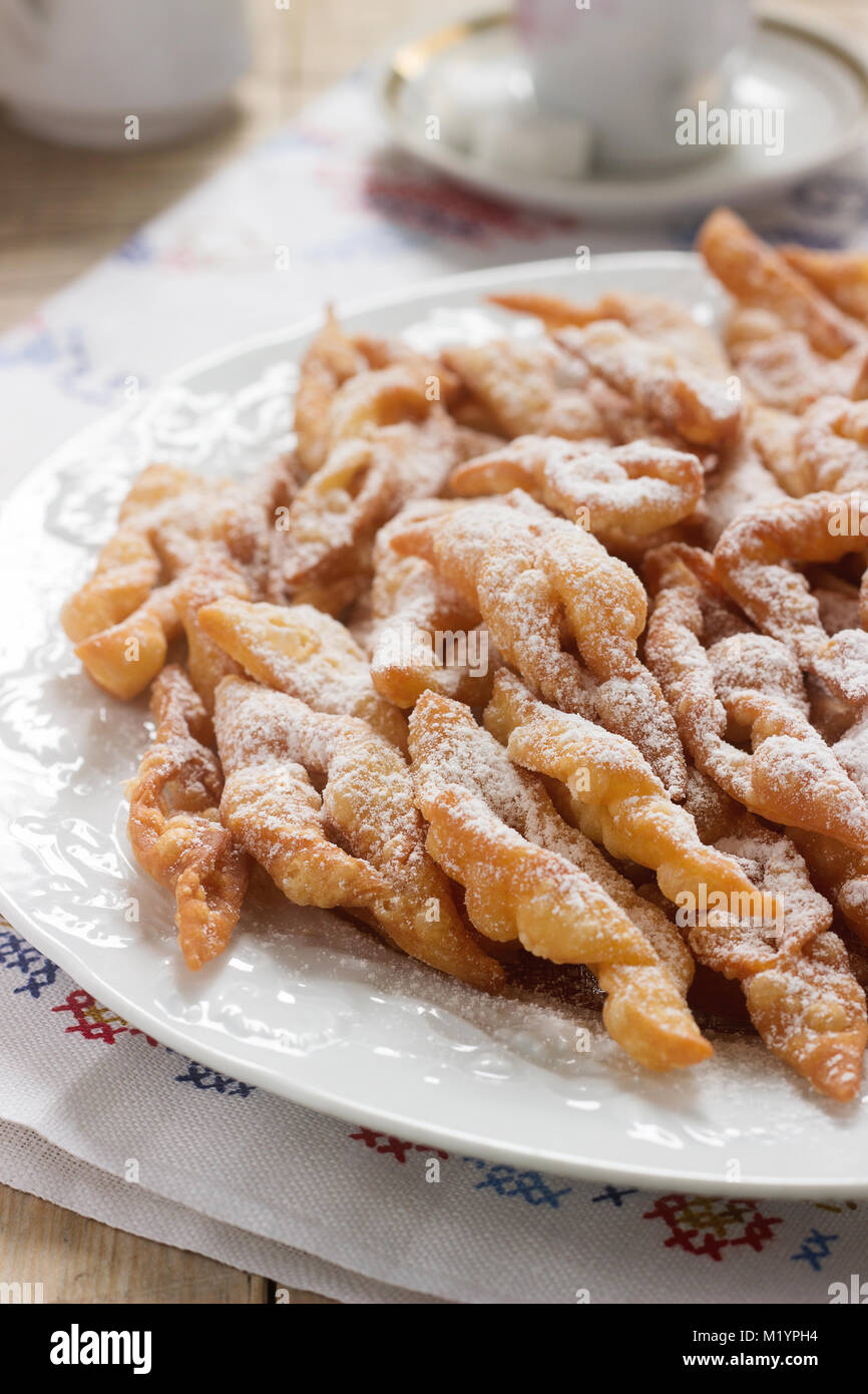 Angel wings biscuits, a traditional European sweet dish for carnival ...