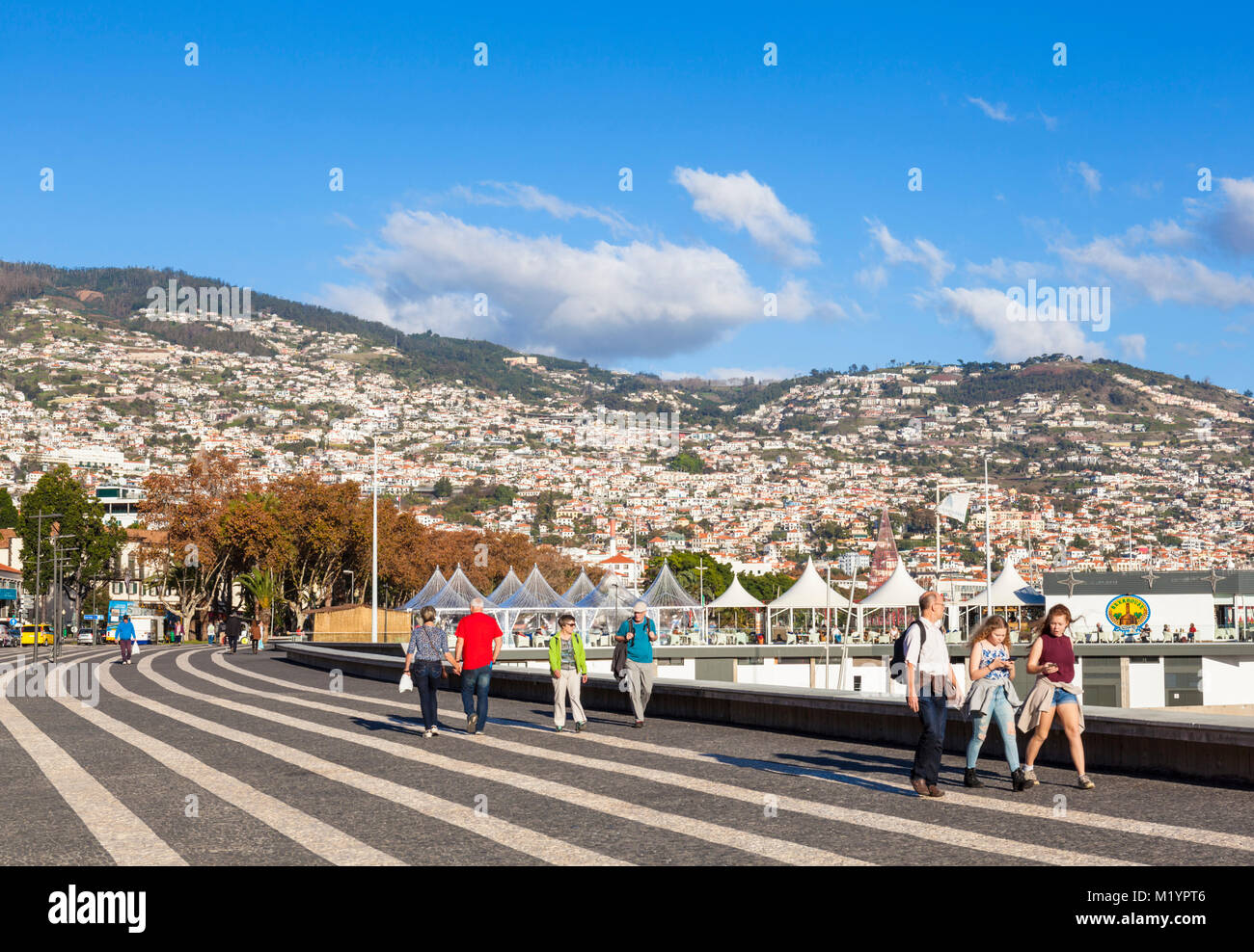 MADEIRA PORTUGAL MADEIRA Funchal seafront promenade with the city of ...