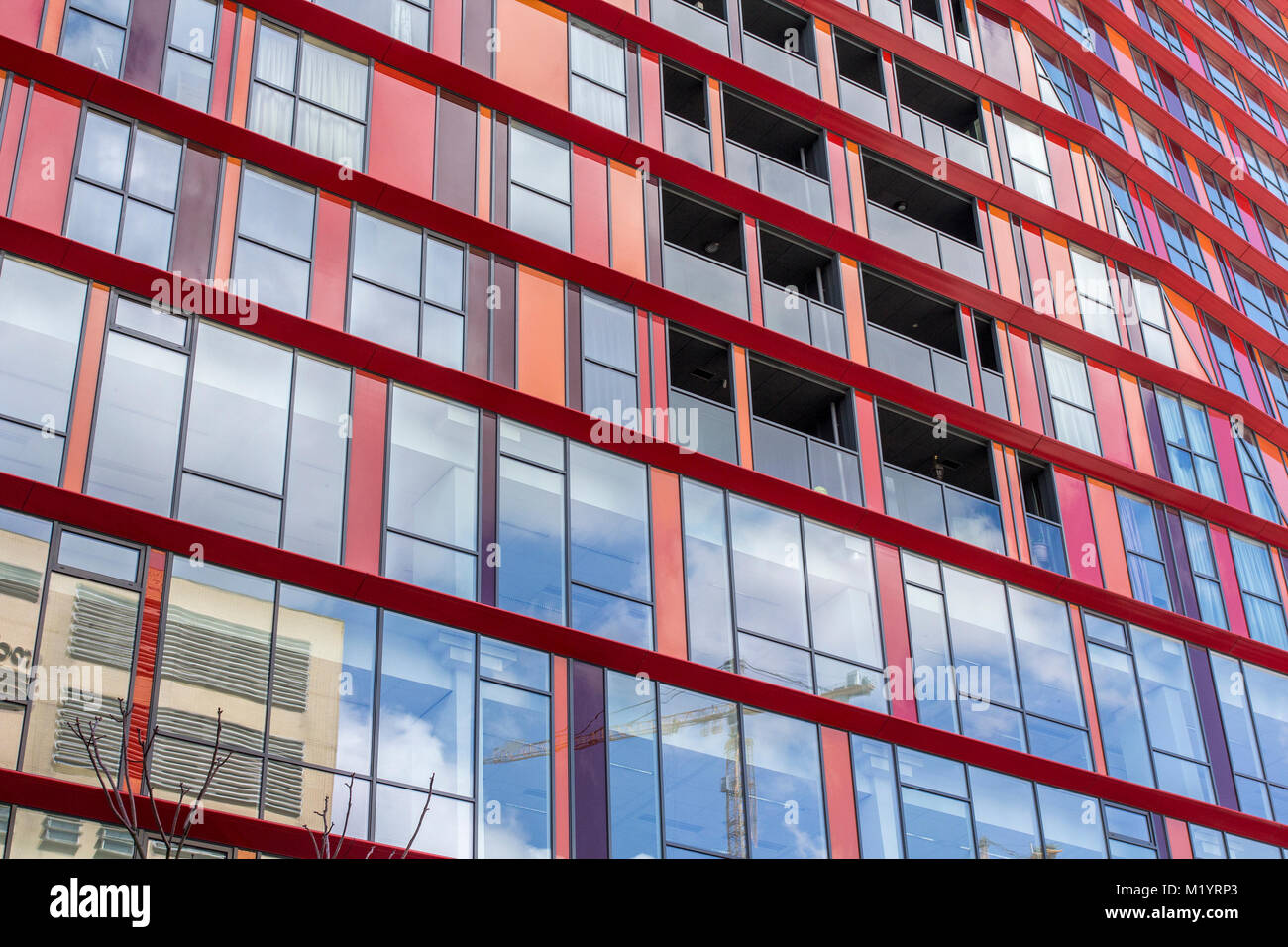 Unique design of a business building in Rotterdam, red parallel windows ...