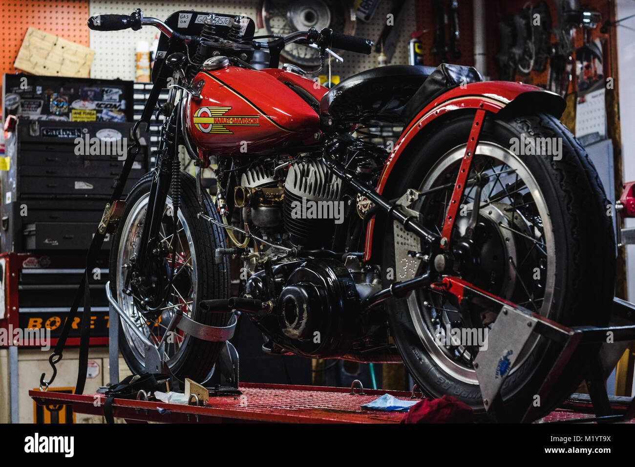inside a motorcycle garage that builds vintage harleys Stock Photo - Alamy