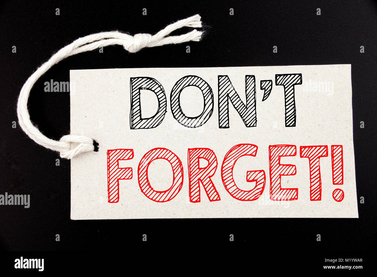 Handwritten text caption showing Do Not Forget. Business concept ...