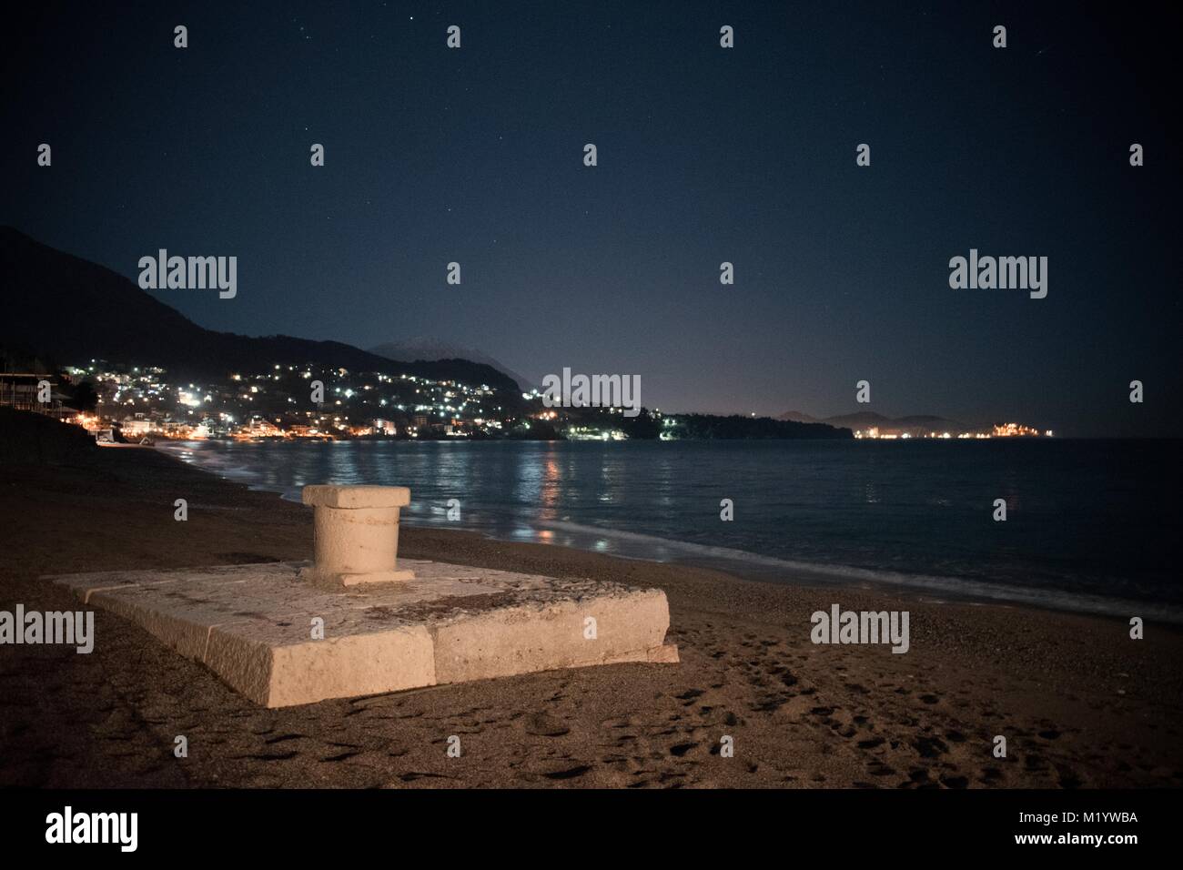 Sea beach at night Stock Photo - Alamy