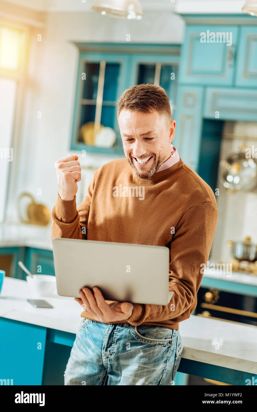 Happy nice man expressing his emotions Stock Photo - Alamy