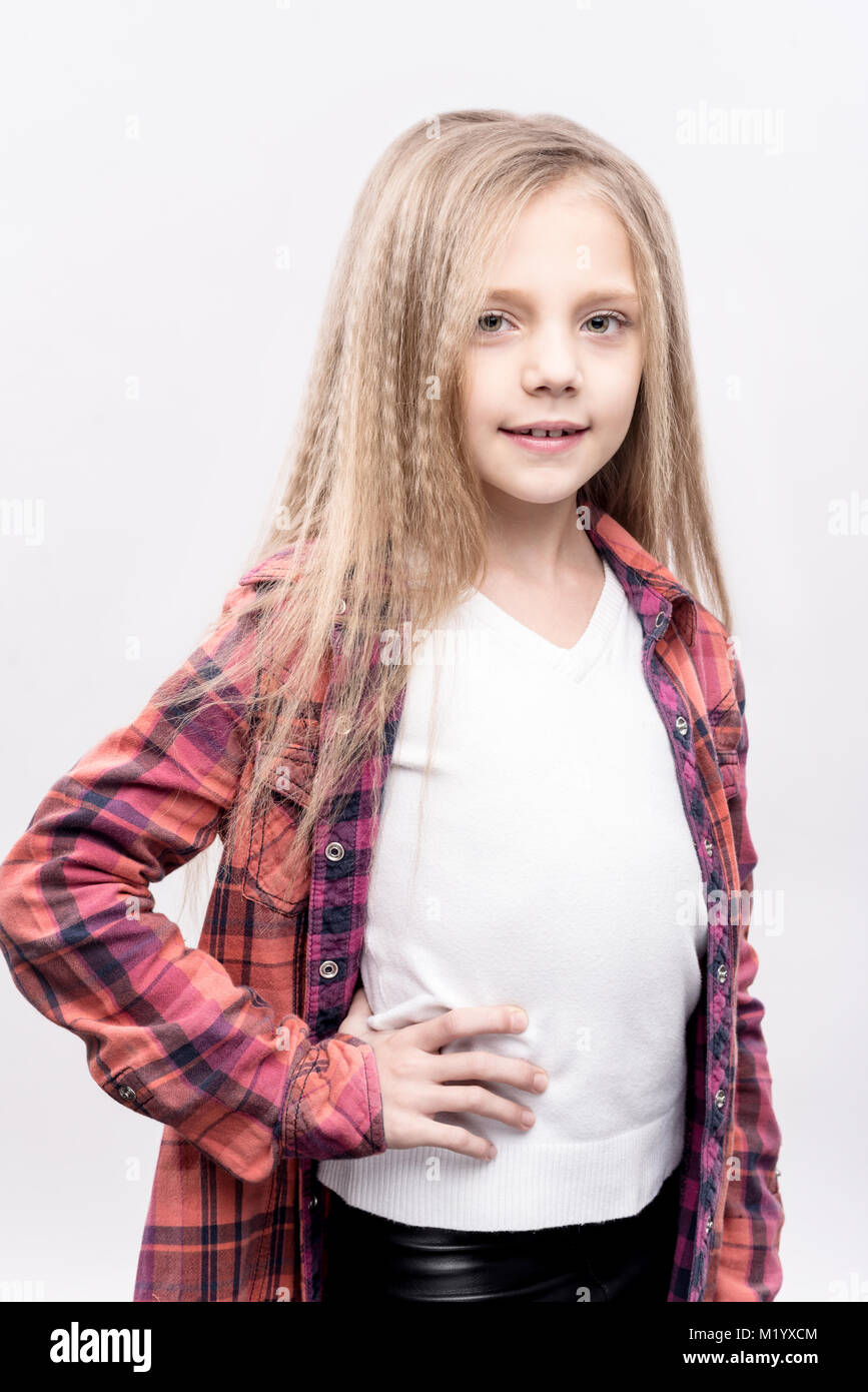 Portrait of fair-haired little girl posing in studio Stock Photo - Alamy