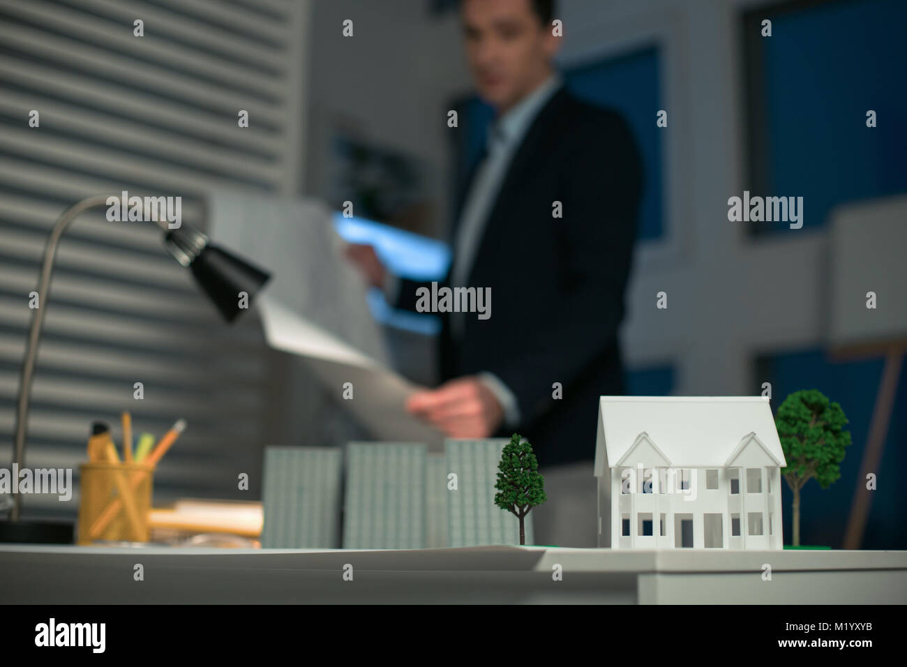 Skillful male engineer working on building Stock Photo - Alamy