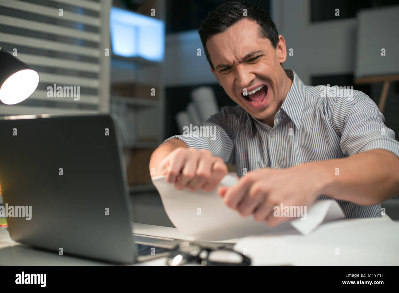 Tearing of papers hi-res stock photography and images - Alamy