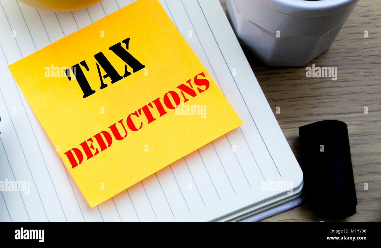 Writing text showing Tax Deductions. Business concept for Finance ...