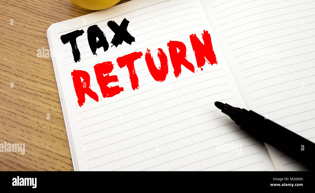 Handwritten text caption showing Tax Return. Business concept writing ...