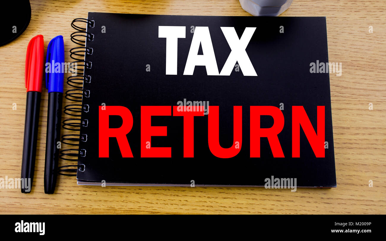 Conceptual hand writing text caption showing Tax Return. Business ...