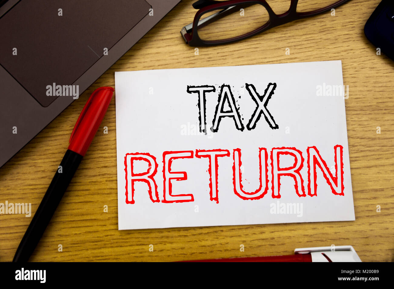 Handwriting Announcement text showing Tax Return. Business concept for ...