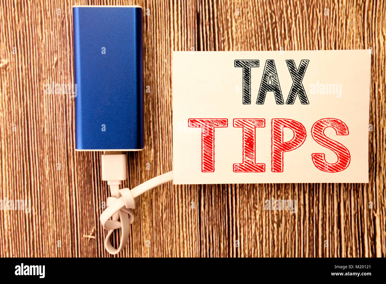 Conceptual hand writing text caption inspiration showing Tax Tips ...