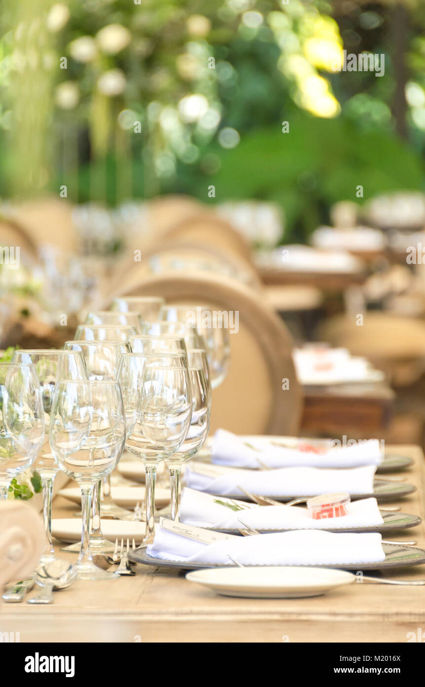 Banquet table set for a reception, party event or wedding celebration ...