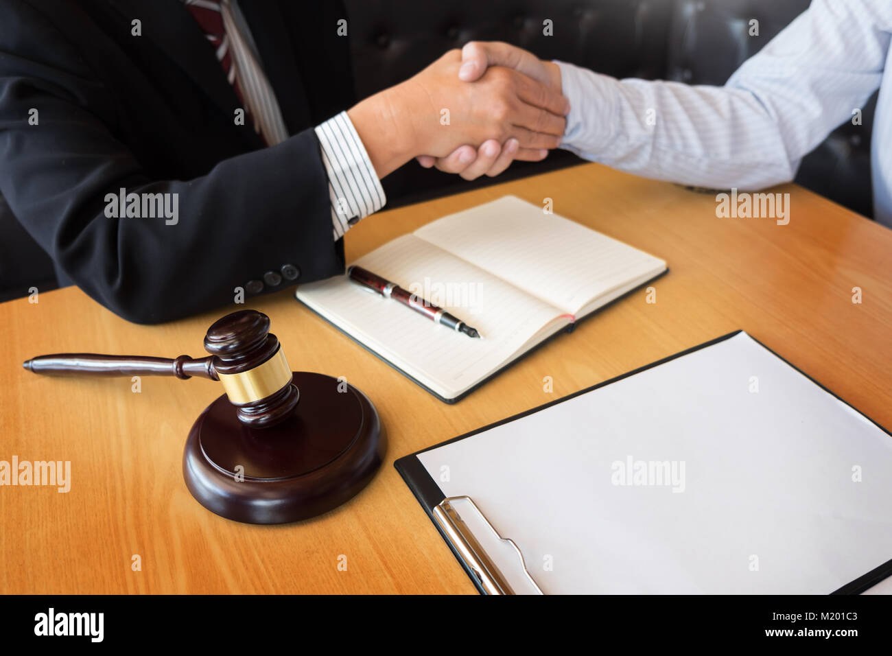Judge lawyer shaking hands in hi-res stock photography and images - Alamy