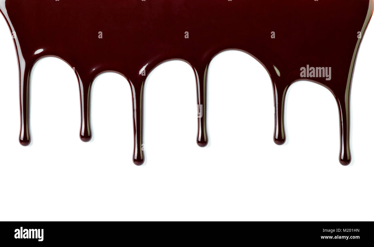 close up of chocolate syrup leaking on white background Stock Photo - Alamy
