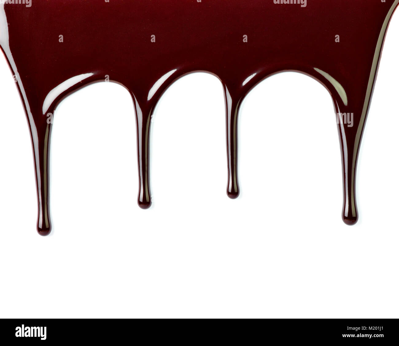 close up of chocolate syrup leaking on white background Stock Photo - Alamy