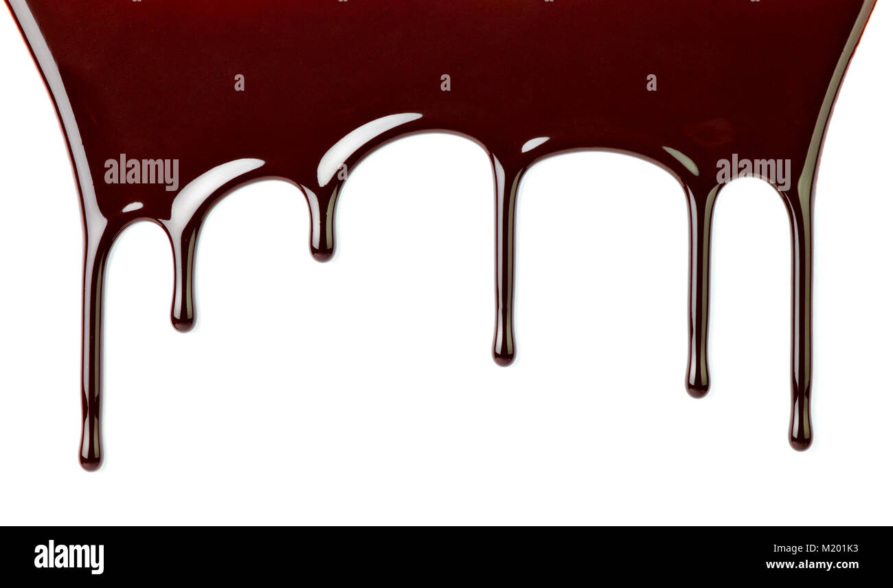 close up of chocolate syrup leaking on white background Stock Photo - Alamy