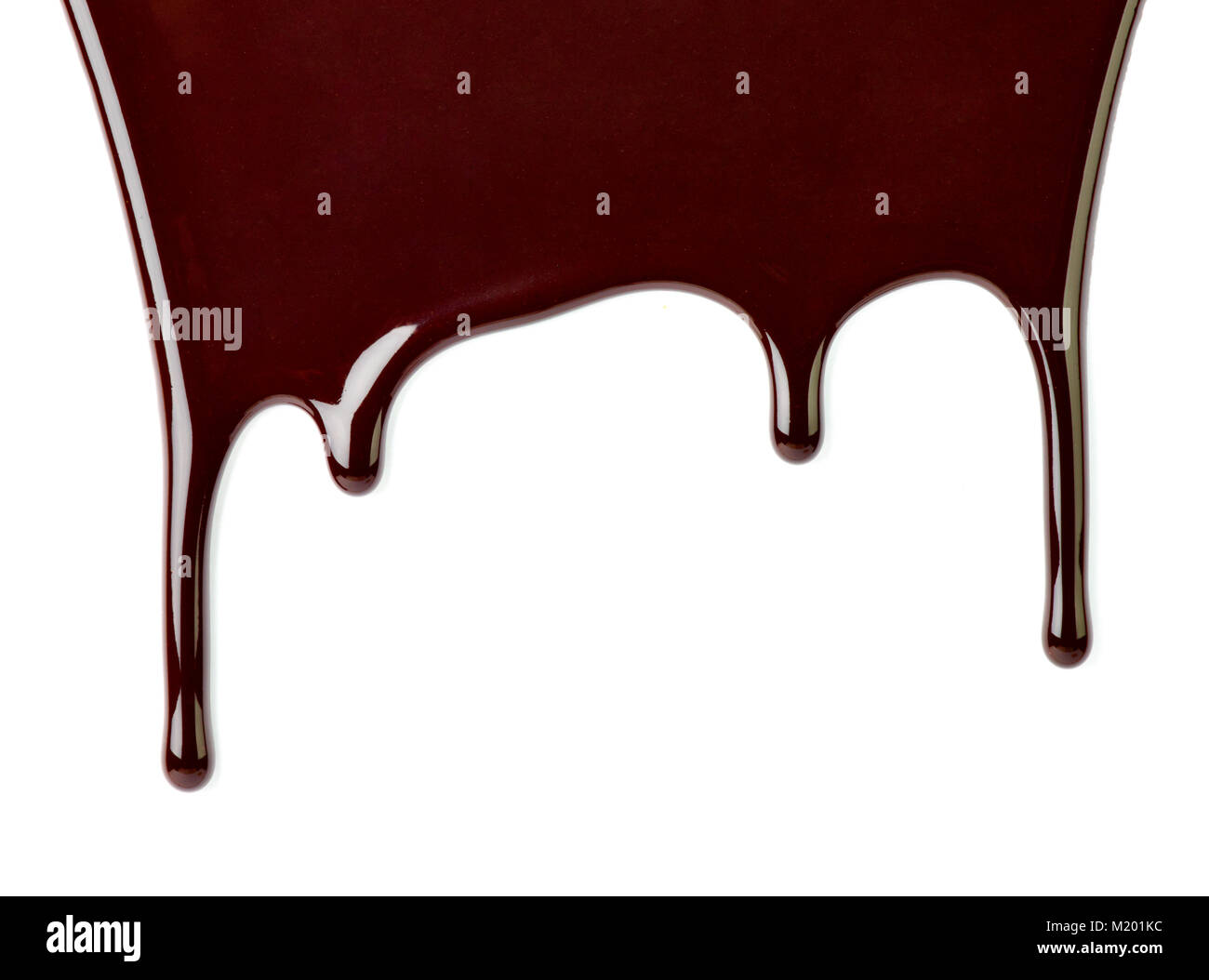 close up of chocolate syrup leaking on white background Stock Photo - Alamy