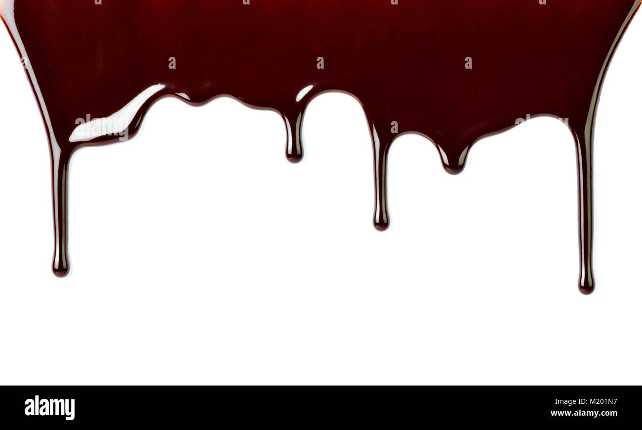 close up of chocolate syrup leaking on white background Stock Photo - Alamy