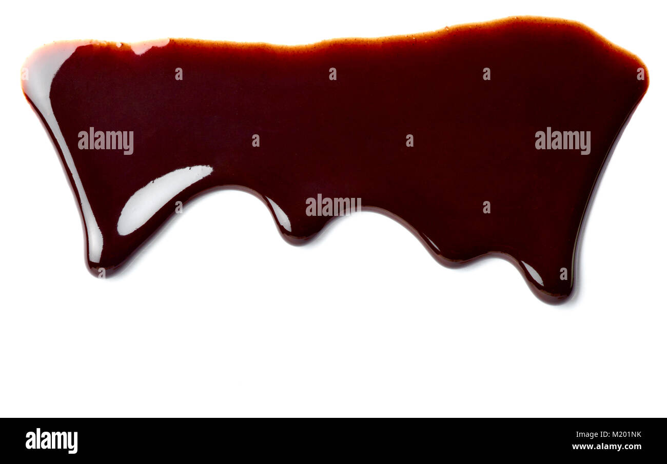 close up of chocolate syrup leaking on white background Stock Photo - Alamy