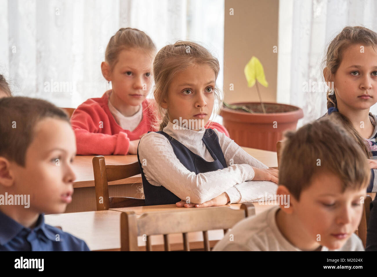 Young kids interacting classroom hi-res stock photography and images ...