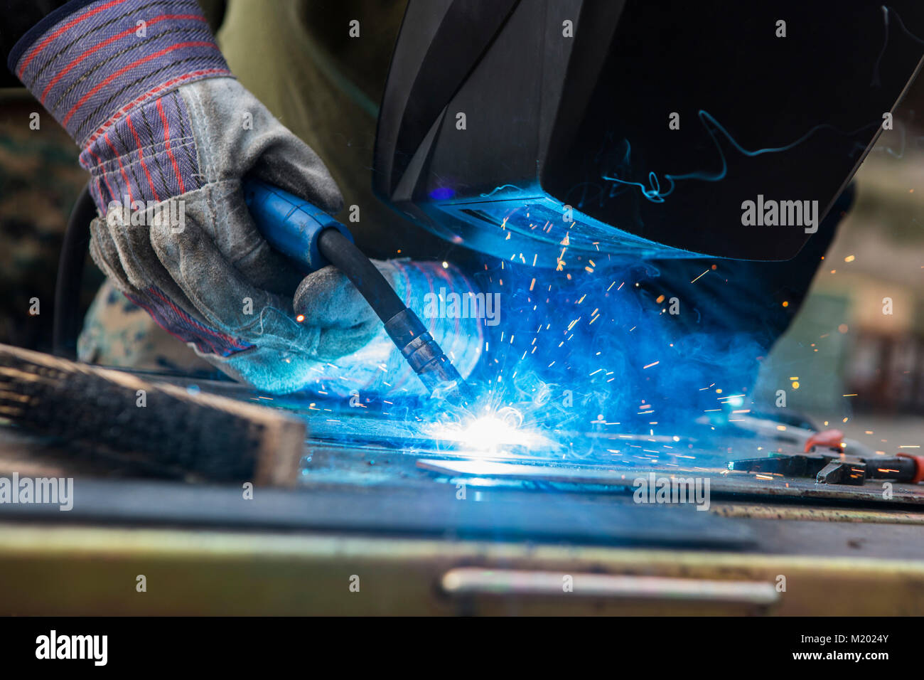 U.S. Marine Lance Cpl. Alante Pierce, a metal worker with 7th Engineer ...