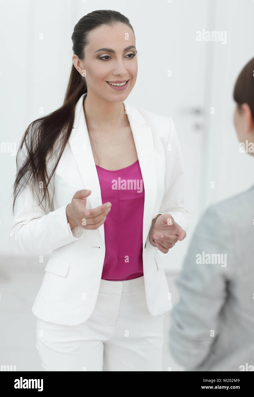 active woman Manager talking with a customer Stock Photo - Alamy