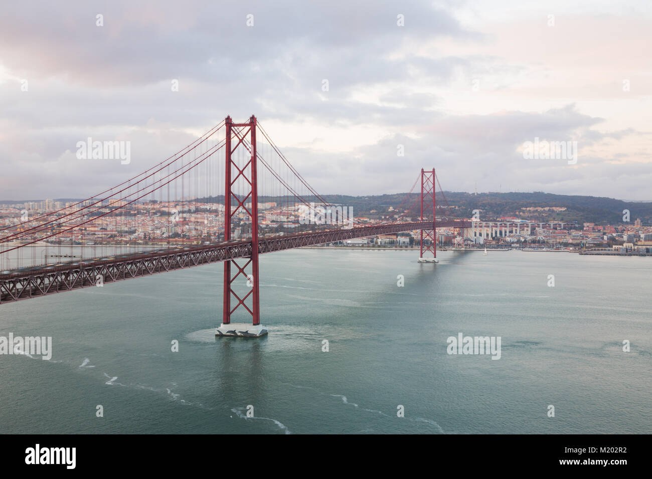 Lisbon (Portugal) - View of river Tejo in the sunset and 25th April ...
